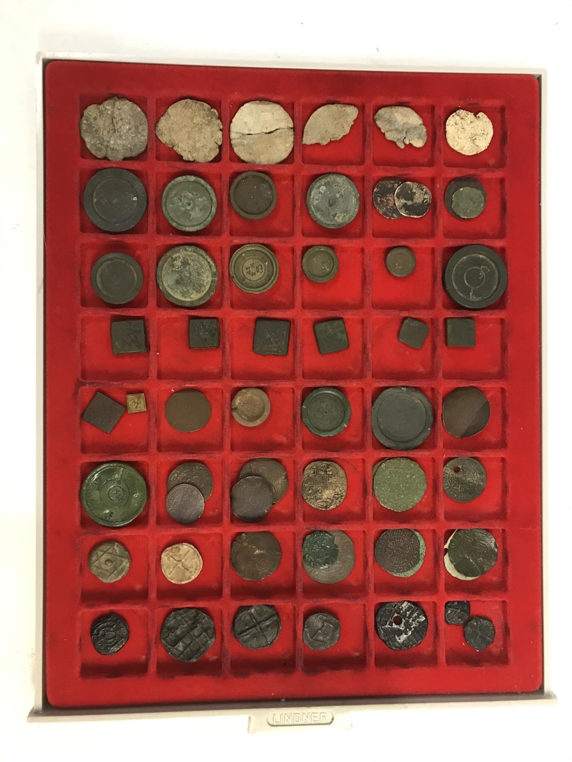 A COLLECTION OF MEDIEVAL JETTONS, WEIGHTS AND OTHER ITEMS. A collection ...