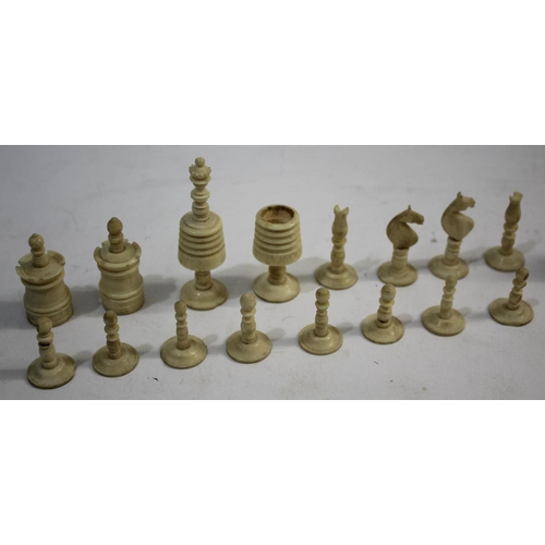 ANTIQUE IVORY CHESS SET a ivory and red stained ivory chess ... | Barnebys