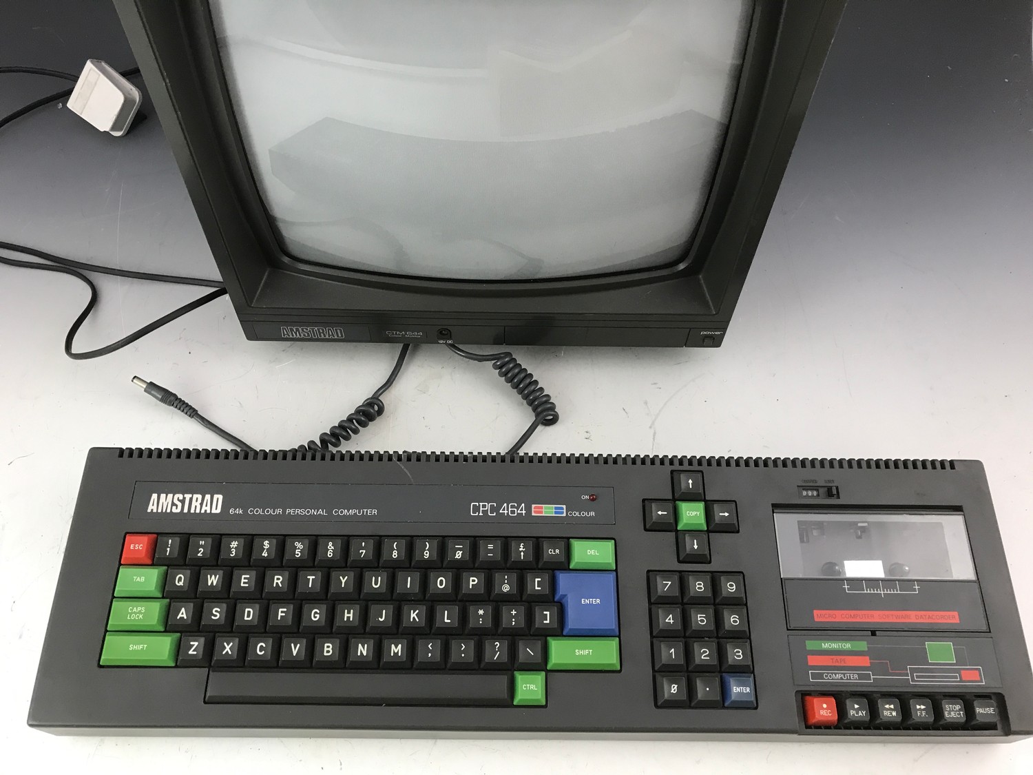 AMSTRAD CPC 464 PERSONAL COMPUTER WITH MONITOR AND QTY. CASSETTE GAMES