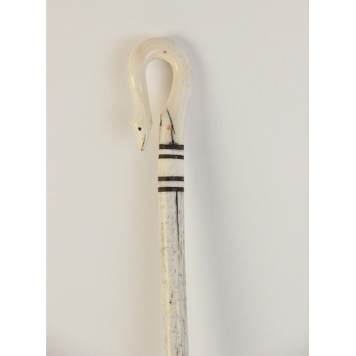 A 19th century bone and marine ivory walking cane, the handl... | Barnebys