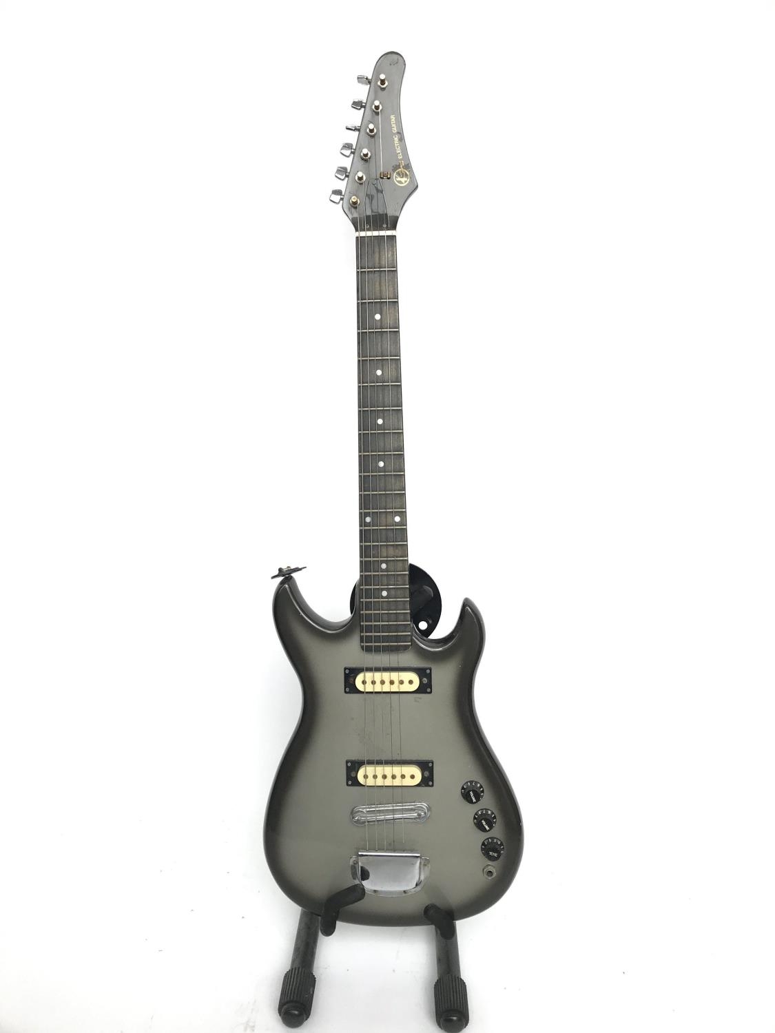 An unusual small scale Kay electric guitar, estimated to be from the ...