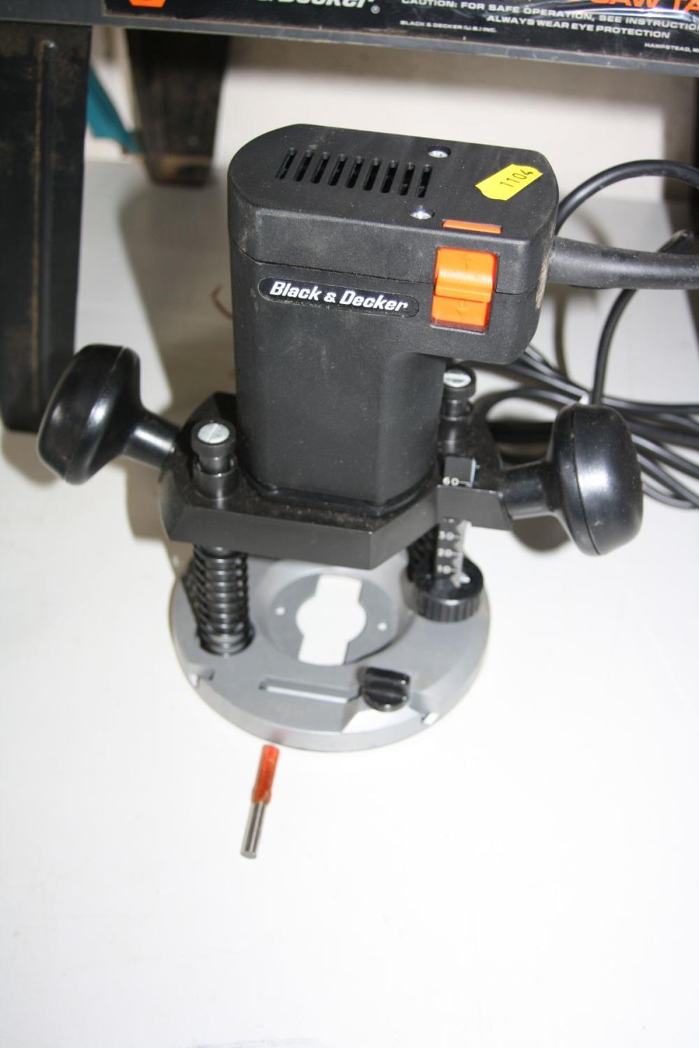 A BLACK AND DECKER BD66 ROUTER, a Black and Decker router table ...
