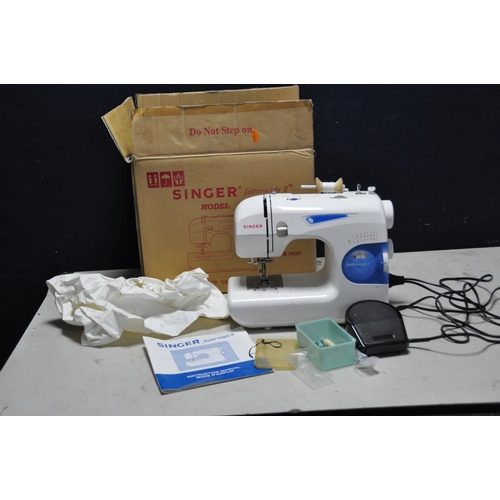 A SINGER MODEL 117 FEATHERWEIGHT 2 SEWING MACHINE with foot ... | Barnebys