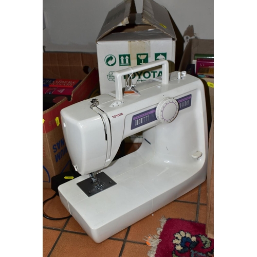 A TOYOTA SEWING MACHINE, model KB13 RS2000, with original bo... | Barnebys