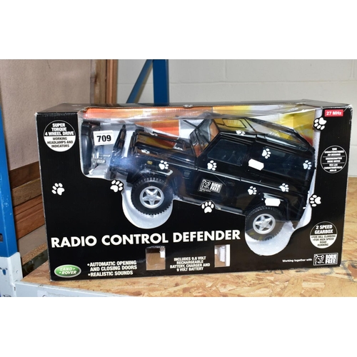 A BOXED HALSALL PLASTIC RADIO CONTROLLED LAND ROVER DEFENDER... | Barnebys