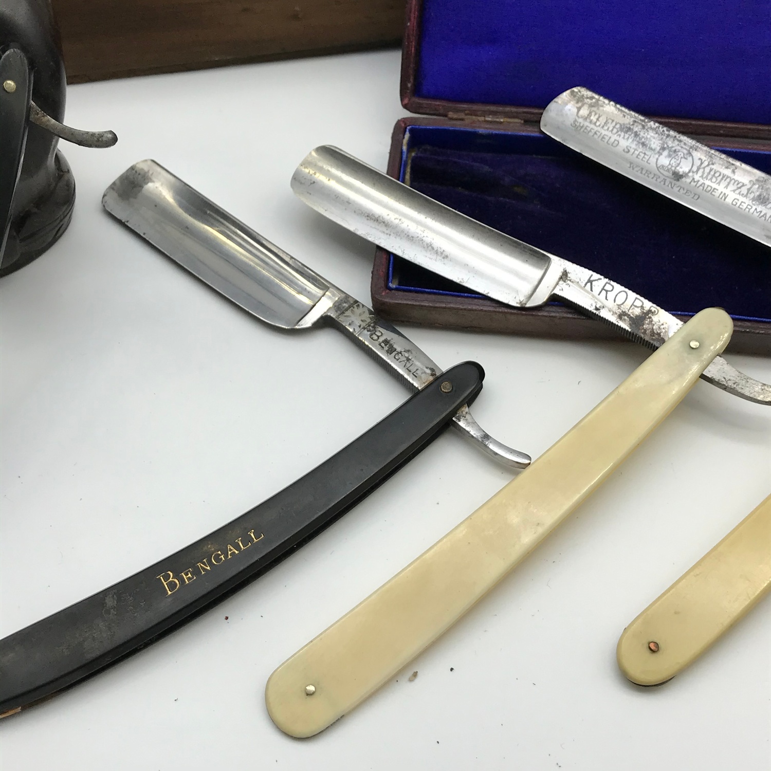 A Collection of 7 antique cut throat razors together with a vintage ...