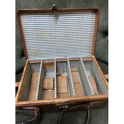 Antique brown leather cartridge carry case. Designed with a well made lock