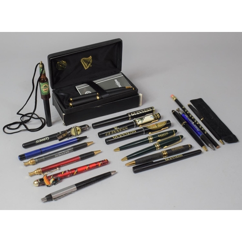 A Collection of Various Guinness Pens and a Pen Set | Barnebys