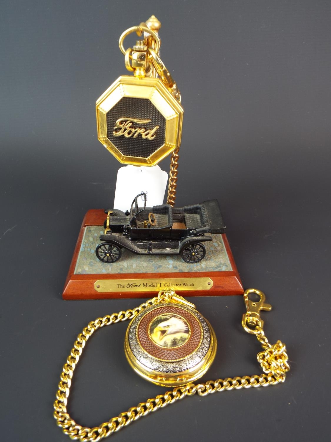 Franklin Mint Mechanical pocket watch with yellow metal chain on a Ford ...