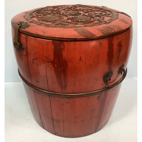 A red stained, carved wooden Chinese rice barrel, of typical... | Barnebys