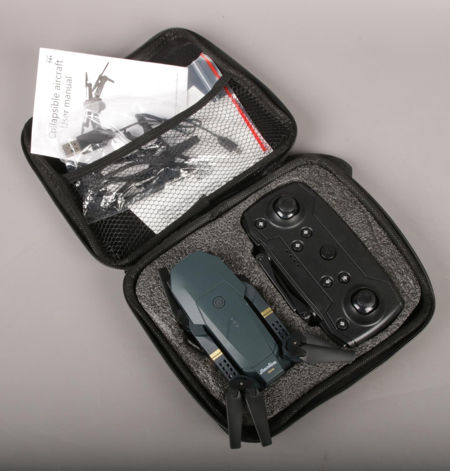 A cased Emotion Drone collapsible remote control aircraft.