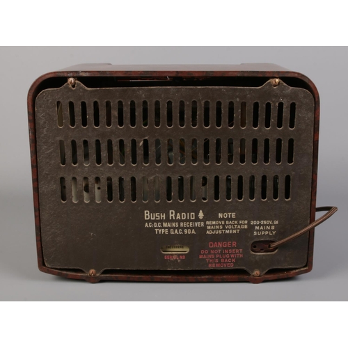 A Bakelite Bush DAC90A Vintage Radio, complete with instruction booklet.