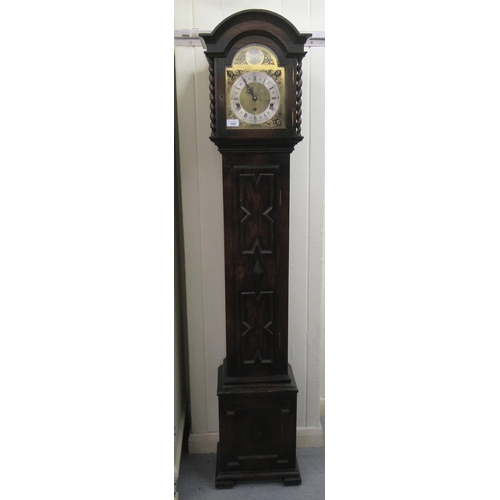 A 1920s/1930s oak cased granddaughter clock, the chiming mov... | Barnebys