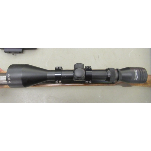 A Weihrauch HW77 .22 air rifle with attached Hawke 3-9x50 scope, Armson ...