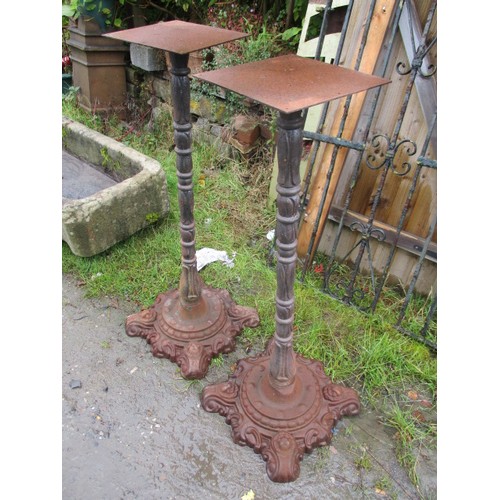 2 cast iron stands, 39 inch tall