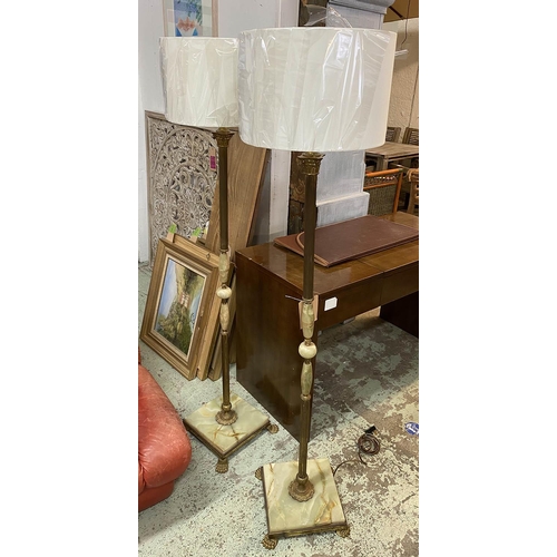 FLOOR LAMPS, a pair, classical column form, gilt metal and o... | Barnebys