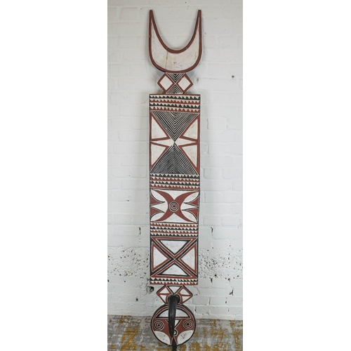 BUNI PLANT MASK, Burkina Faso, with a circular face at one e... | Barnebys