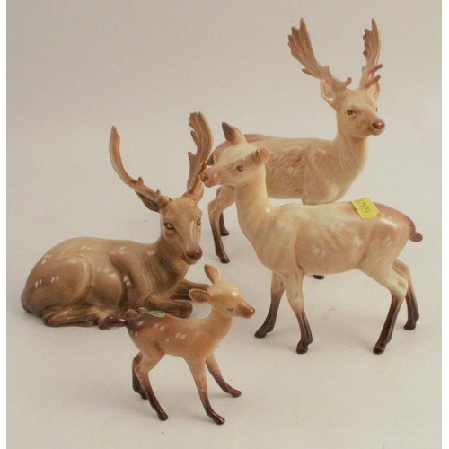 Four Beswick models, of stags, doe and faun | Barnebys