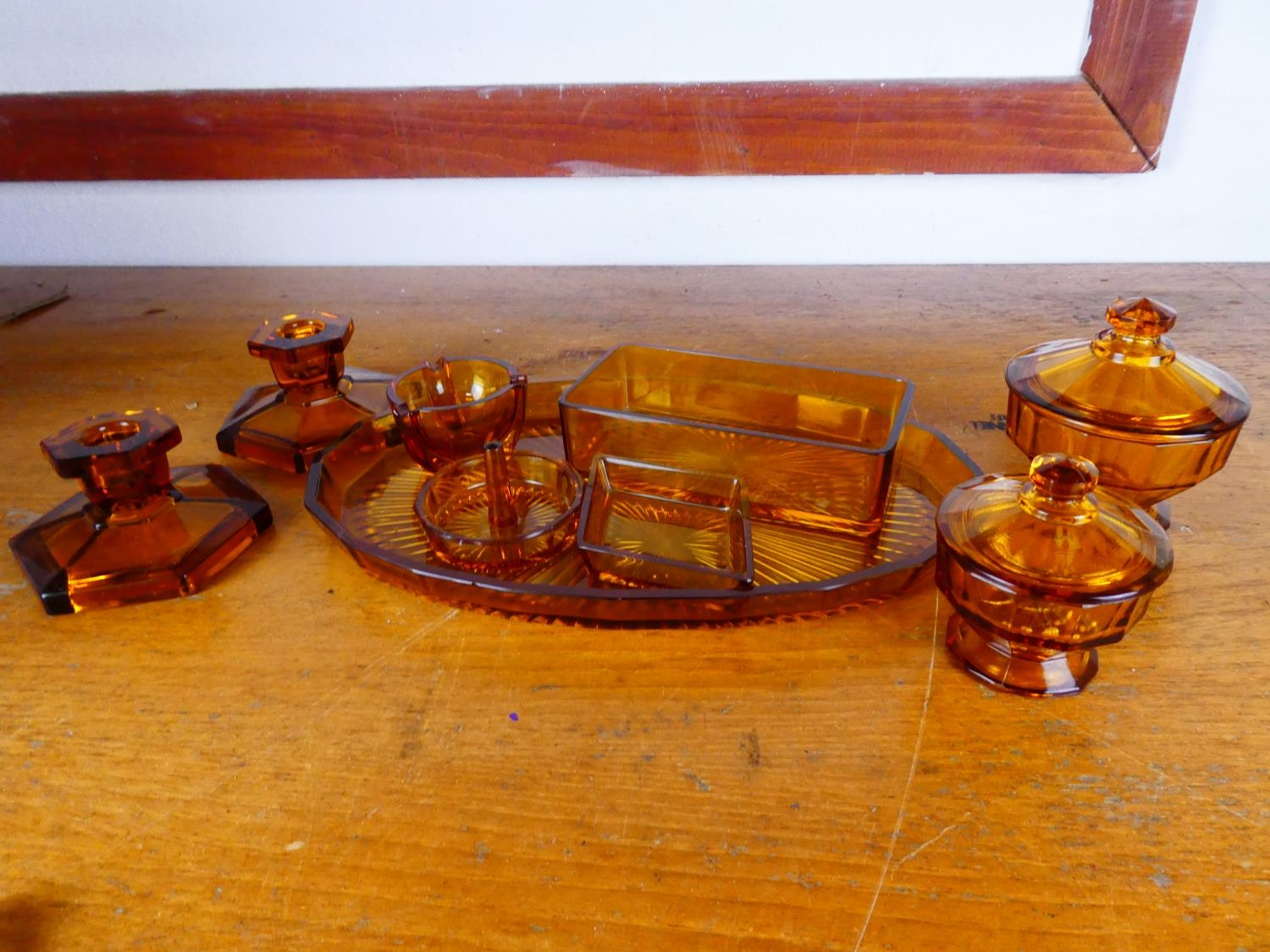 A vintage Art Deco amber glass dressing table set.