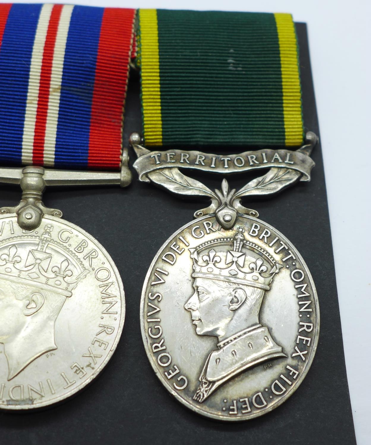 A group of six George VI British medals;- the Territorial Medal named ...