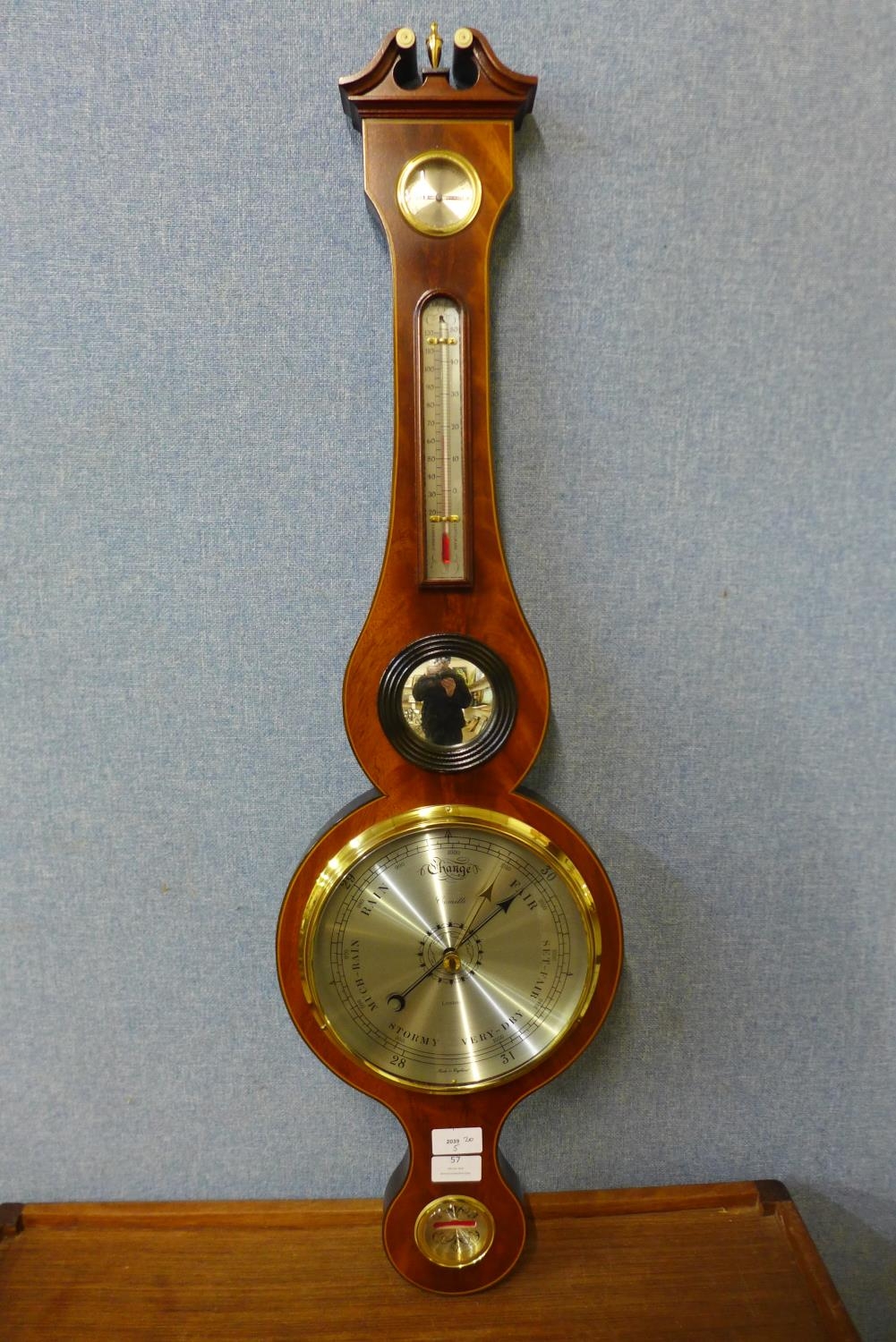 A Comitti of London mahogany aneroid barometer
