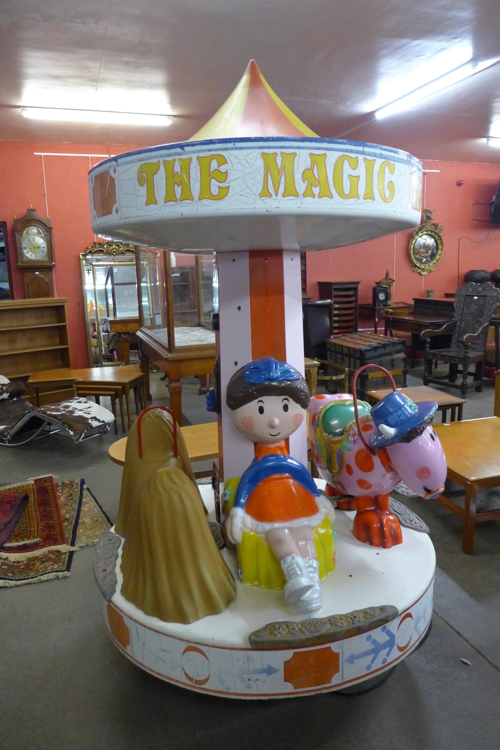 A late 20th Century coin operated child's The Magic Roundabout ride