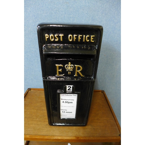 A black painted Post Office letter box, with key | Barnebys