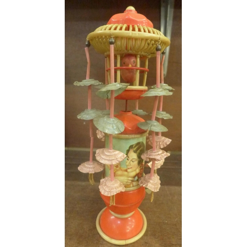 A Japanese made chiming clockwork carousel toy, Hibiki, Usui | Barnebys
