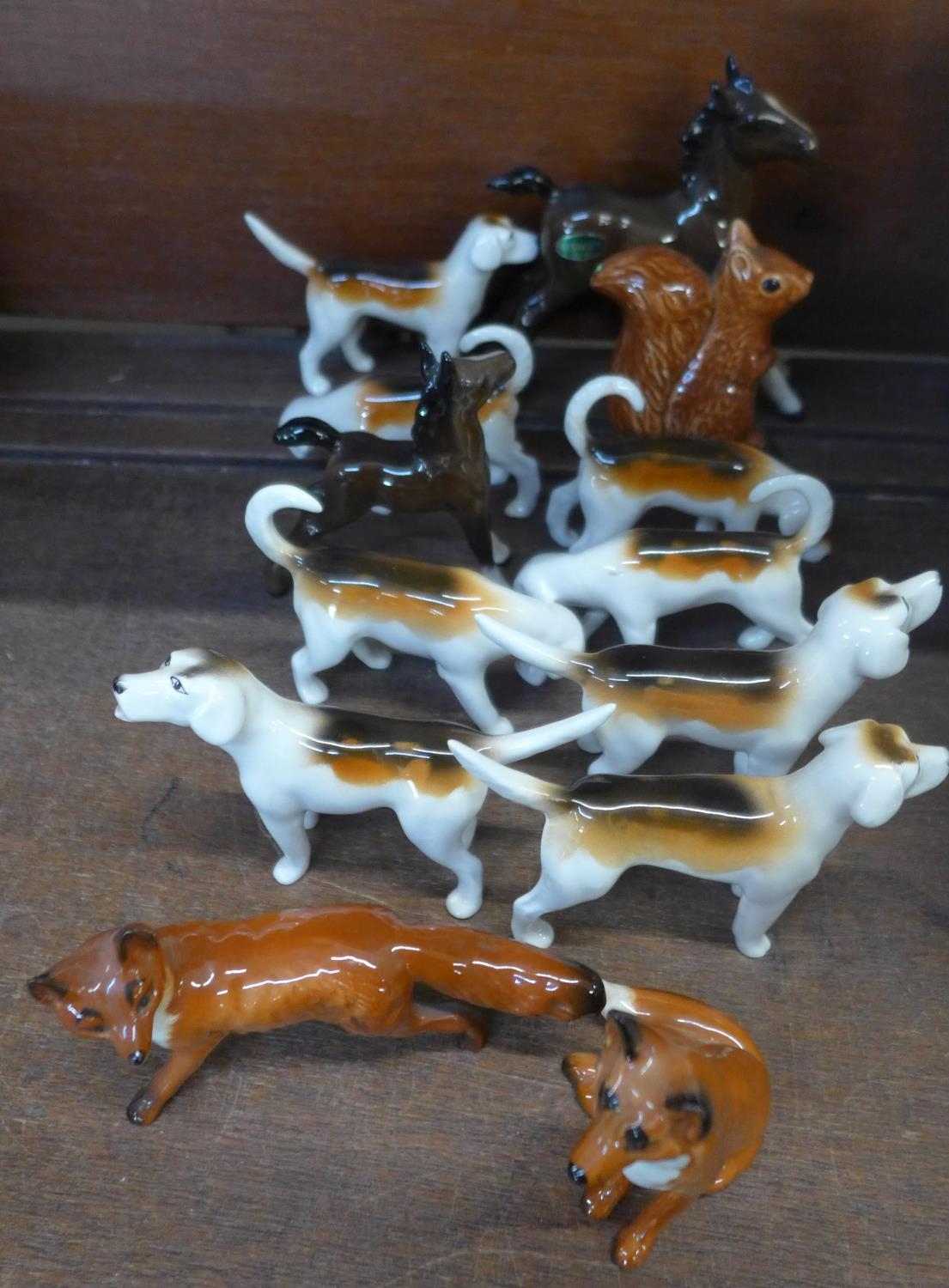 Eight Beswick hounds, two Beswick foxes - auctions & price archive