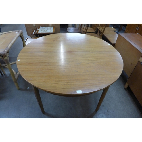 A Nathan teak extending dining table | Barnebys