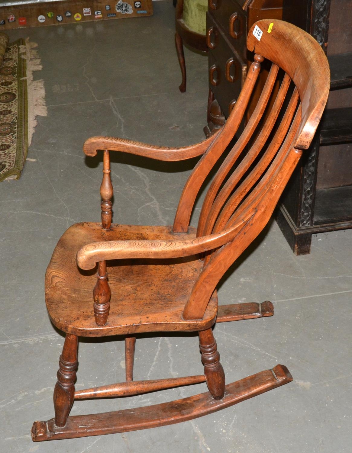 Antique elm seated slat back rocking chair
