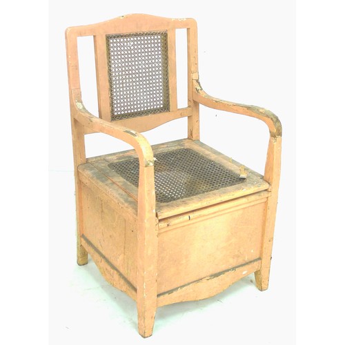 A Victorian commode chair, painted pink, with lift caned sea... | Barnebys