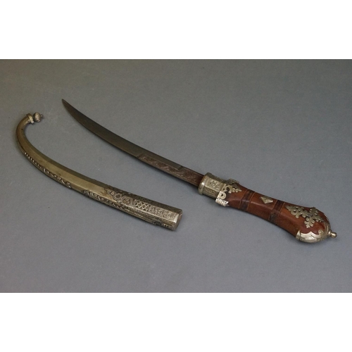 Indian ceremonial dagger in scabbard | Barnebys