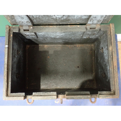 A cast iron Strong Box with panelled top and sides, 18in W x 12in H