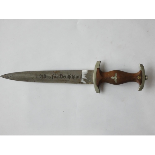A German reproduction Third Reich SA dagger, the wooden hand... | Barnebys