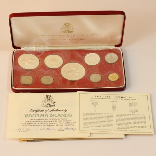 A Franklin Mint 1973 proof set of nine coins, four silver, certificate ...