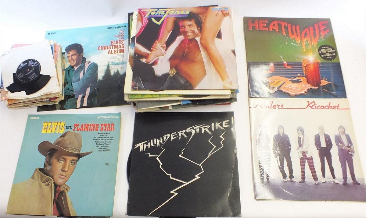 A box of 1970's LP records including Elv... - auctions & price archive