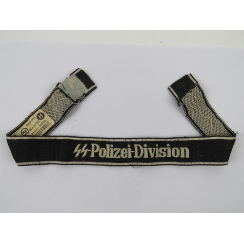 A WWII German cuff title for SS Polizei-Division, bearing RZ... | Barnebys