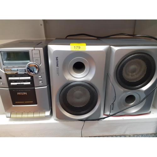 A Philips MC-110 Micro music system with a pair of speakers ... | Barnebys