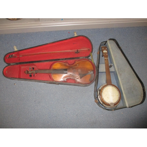 An early 20th century cased violin and bow and a Vaudeville ... | Barnebys