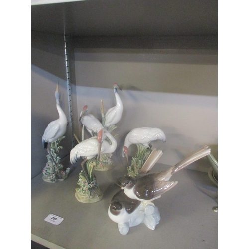 A collection of Lladro stork models A/F and a bird group Loc... | Barnebys