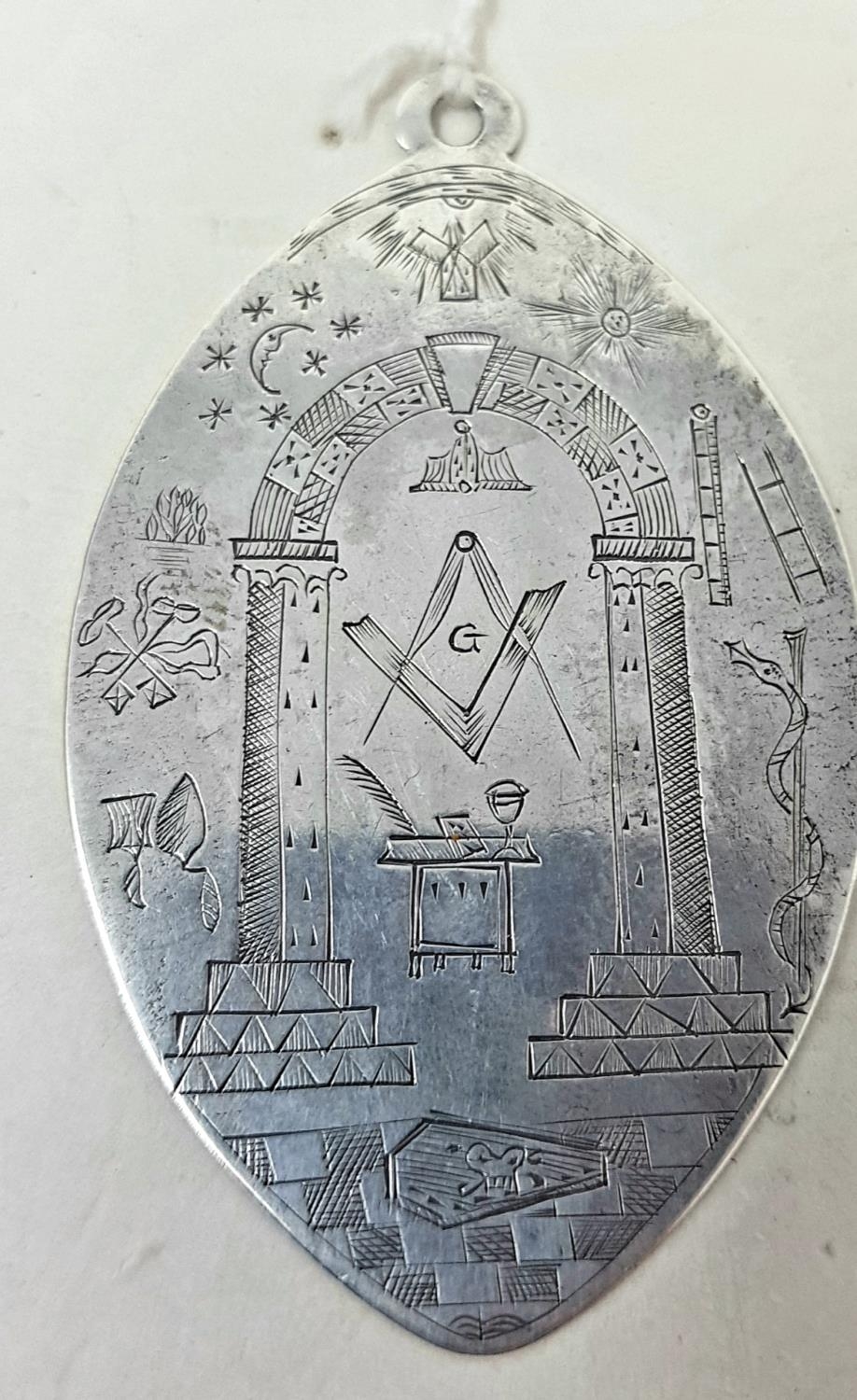 An 18th/19th century silver coloured metal Masonic medallion, engraved ...