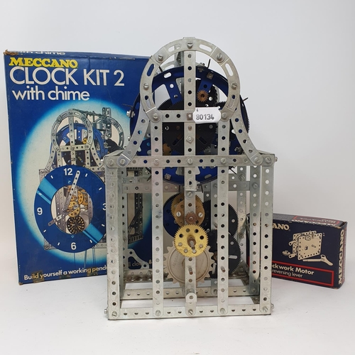 A Meccano clock kit 2, with a chime, box and other Meccano (... | Barnebys