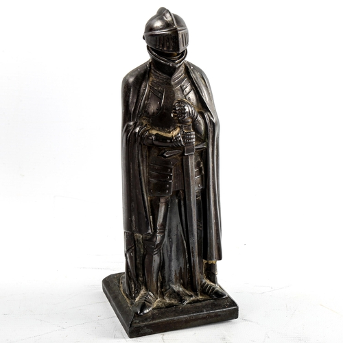 A spelter knight figure table lighter, early 20th century, h... | Barnebys