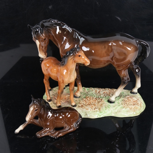 Beswick porcelain mare and foal group, and Beswick recumbent... | Barnebys