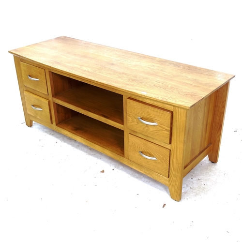A modern light oak television stand, with open shelves and 4... | Barnebys
