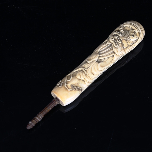 A Japanese relief carved ivory parasol handle, with carp and... | Barnebys
