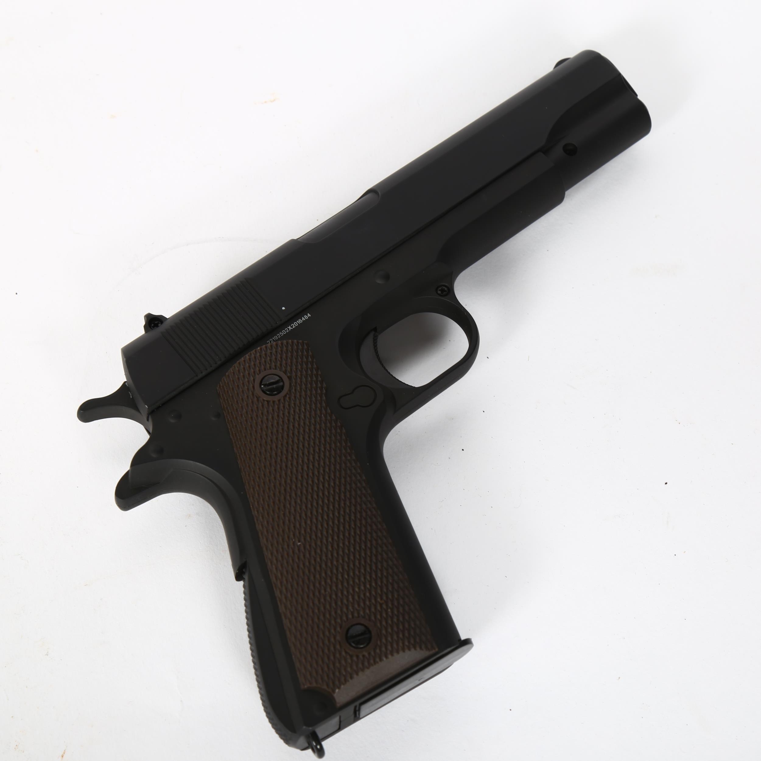 A replica Colt 1911 BB pistol, length 20cm