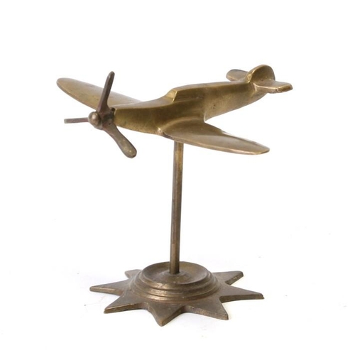 A brass model of the Supermarine Spitfire with turning prope... | Barnebys