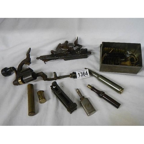 A flintlock mechanism, a cartridge loader, various shells an... | Barnebys